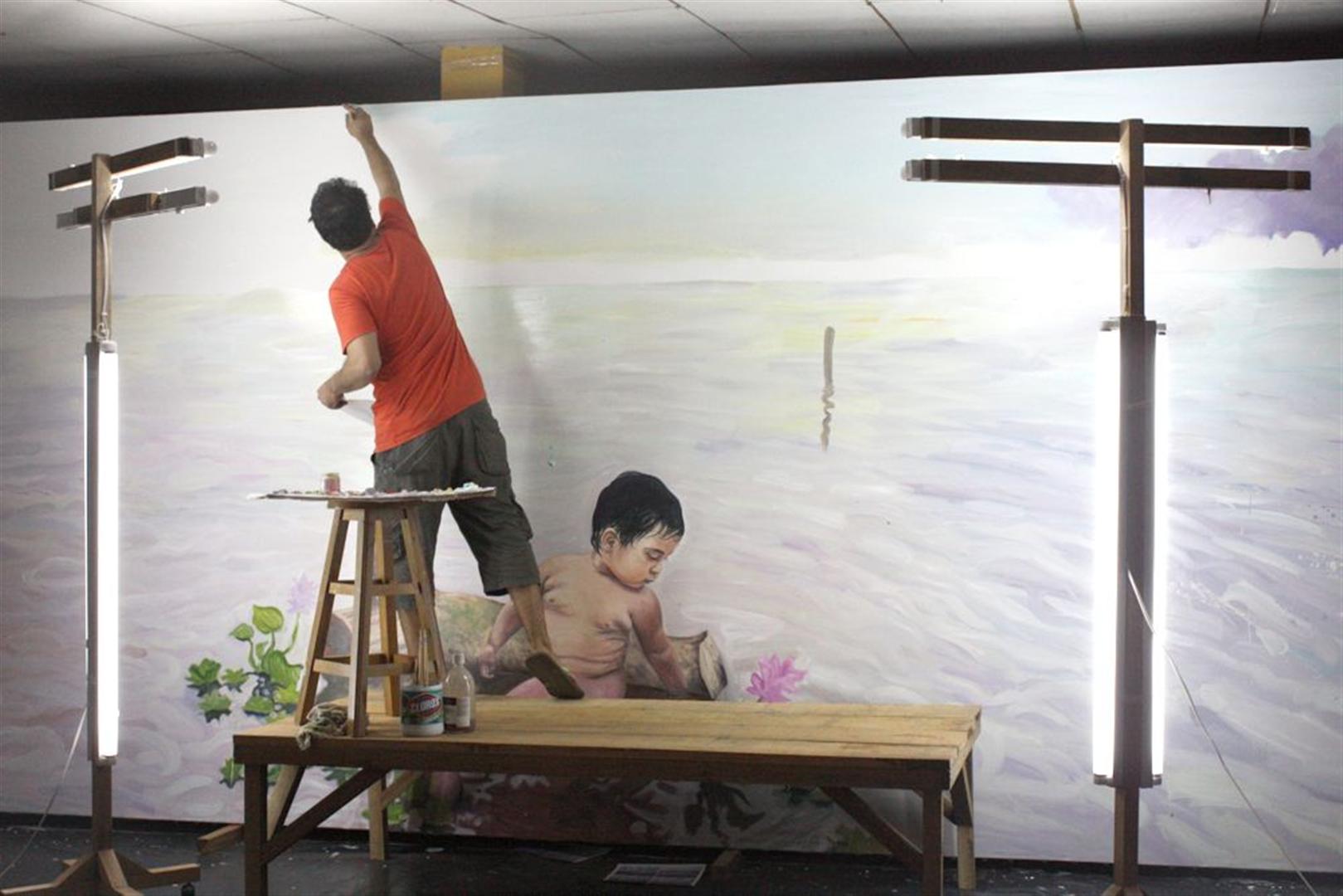 Artista Cristian Bendayán abocado en la elaboración del mural "El río ...